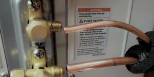 How to Repair a Hole in a Copper AC Line
